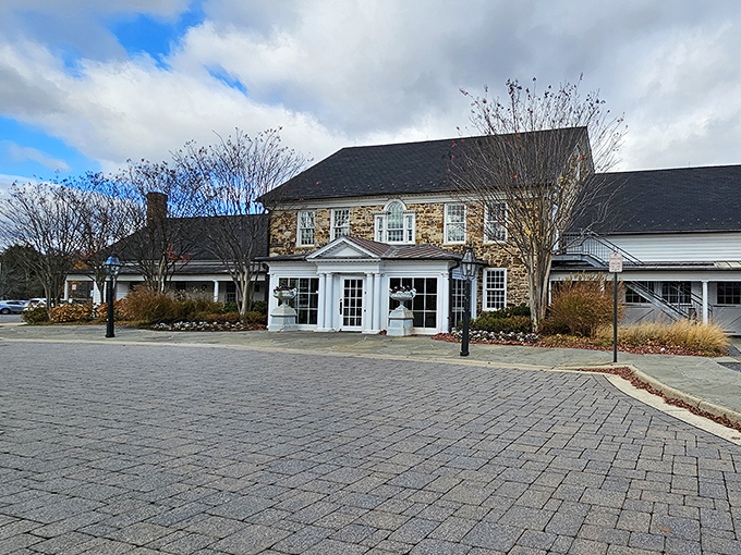 Winter's bare branches frame this historic stone structure, where comfort food gets the royal treatment without the royal attitude.