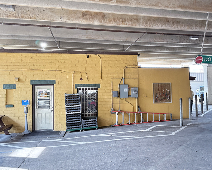 That yellow brick exterior isn't leading you to Oz, but to something arguably better: legendary hot dogs in an actual alley.