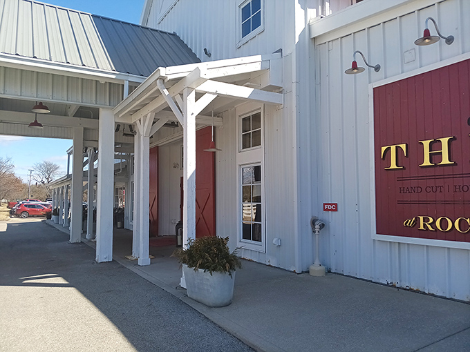 The classic red and white exterior of The Barn at Rocky Fork Creek isn't just farm-chic architecture&mdash;it's a promise of the heartland hospitality waiting inside.