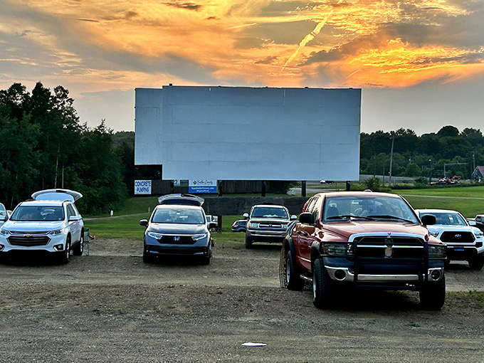 The perfect Pennsylvania sunset creates nature's own pre-show, painting the sky above Starlight's massive screen with colors no CGI could match.