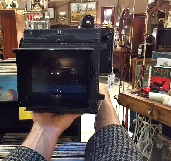 Someone's holding what appears to be a vintage camera&mdash;proof that Instagram filters are just pale imitations of what real photographers achieved with actual skill.