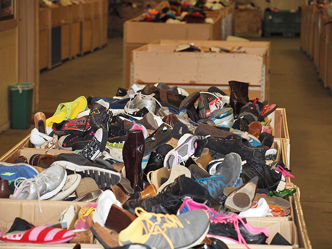 A footwear bonanza that would make Imelda Marcos weep with joy. Your perfect pair is hiding somewhere in this blue bin.