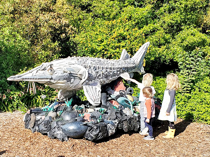 Environmental art at its finest! Children discover that even discarded materials can transform into something magical&mdash;like this metallic fish made from repurposed debris.