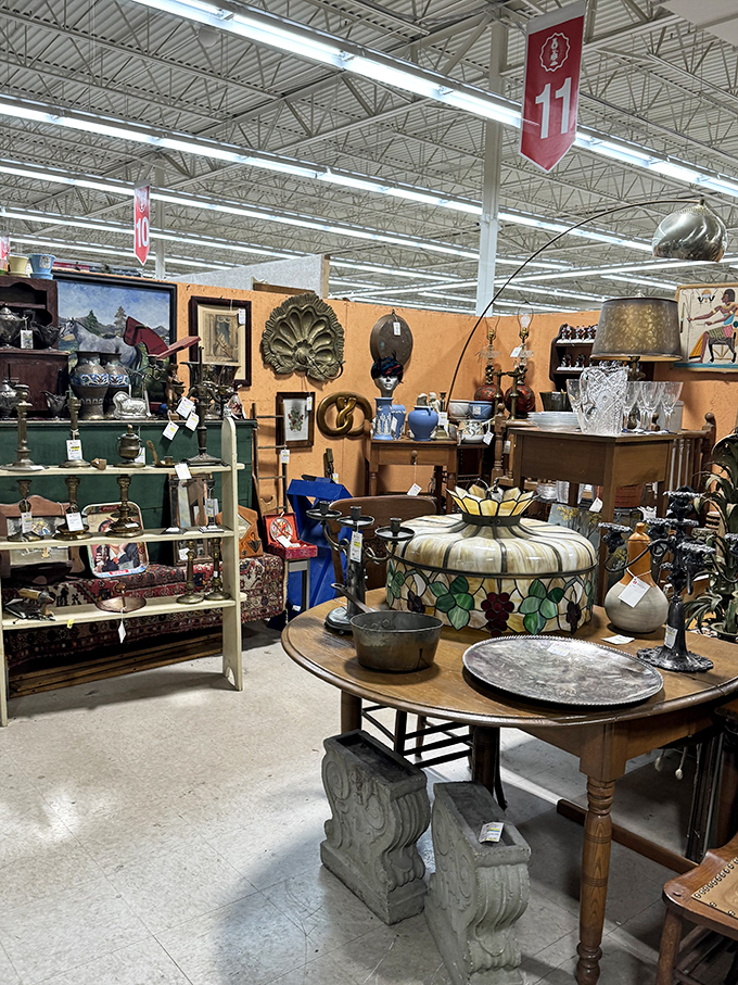That arching floor lamp towers over collections of pottery, glassware, and treasures arranged like an interior designer's fever dream.