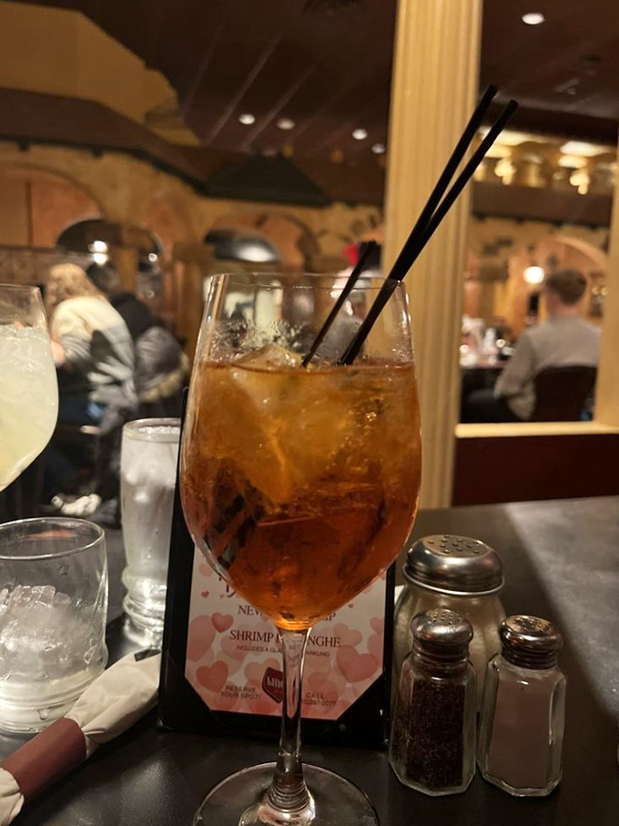 An Aperol Spritz that glows like a Tuscan sunset—the perfect companion while deciding between pasta and... more pasta.