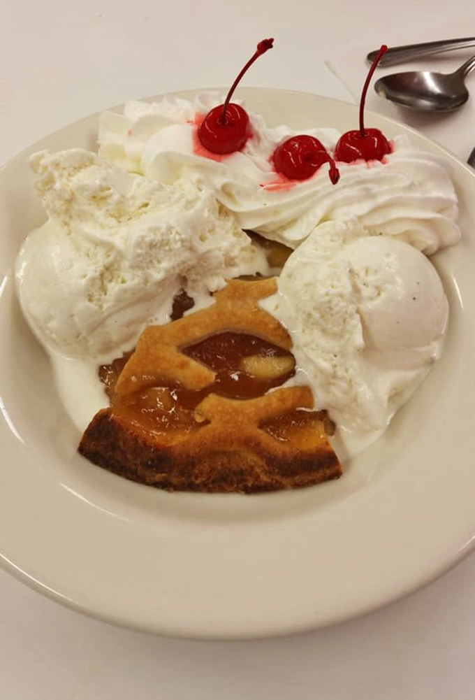 Apple pie &agrave; la mode with those signature maraschino cherries standing at attention&mdash;dessert that salutes the sweet simplicity of American classics done right.