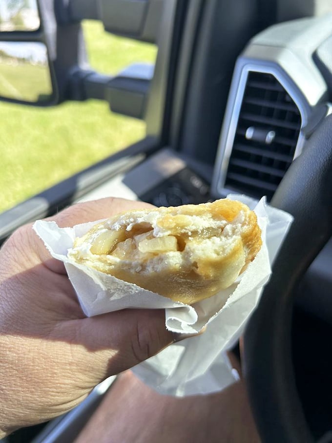 That apple fry pie being enjoyed in a car proves some treasures can't even wait until you get home.