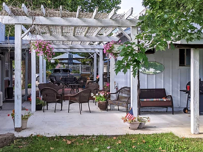 This pergola-shaded patio at Arbor House offers the kind of peaceful outdoor seating that makes you forget deadlines, emails, and possibly your name.