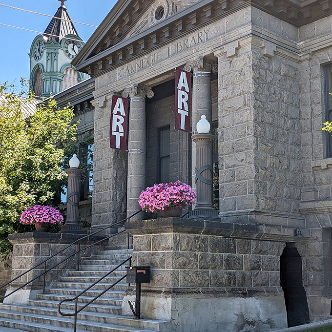 The historic Carnegie Library now serves as an art center, proving culture thrives in small towns where your donation dollars stretch further.