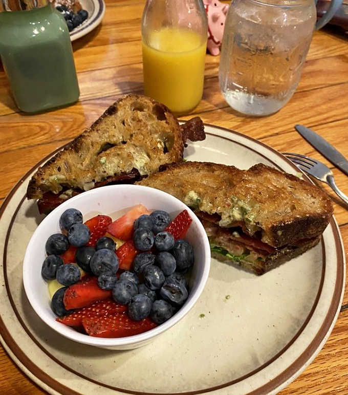 This sandwich and berry bowl combo isn't just breakfast&mdash;it's edible artwork that somehow manages to be both virtuous and decadent.