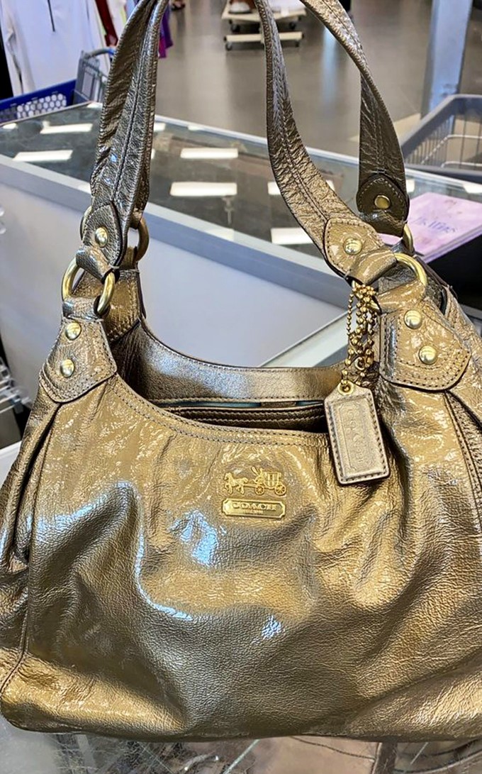 That's not just any handbag&mdash;it's a genuine Coach waiting for its second act. Luxury finds hiding in plain sight for the patient hunter.