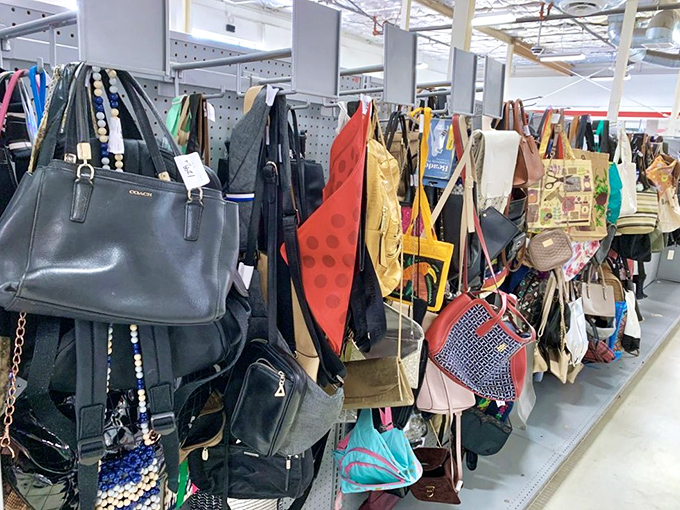 Handbag heaven! Designer lookalikes and occasional authentic treasures hanging like fashionable fruit, ripe for the picking.