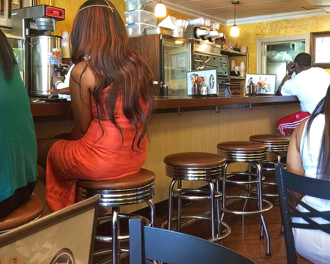 The counter seating&mdash;where solo diners become part of the Busy Bee family and regulars exchange knowing nods about what to order. Some of Atlanta's best conversations happen here.