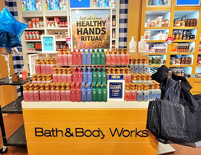 Bath & Body Works: The scent sanctuary where "just one hand soap" becomes a bag full of seasonal fragrances and impulse buys.