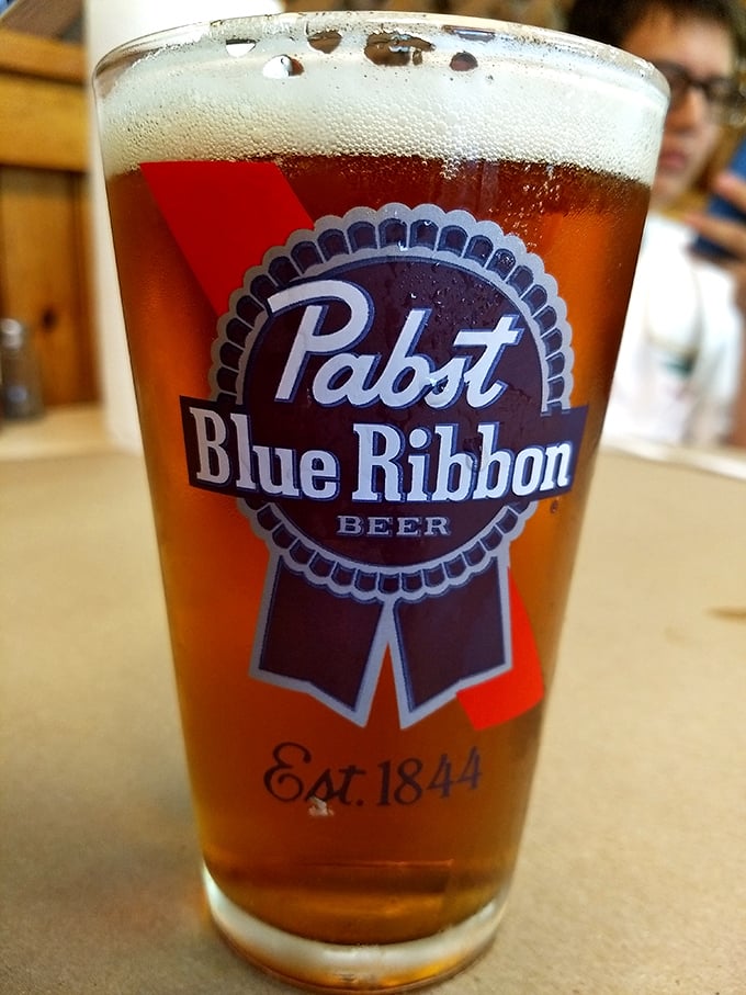 A cold PBR &ndash; because sometimes the perfect pairing for spectacular seafood is beautifully simple. The foam crown completes this royal refreshment.