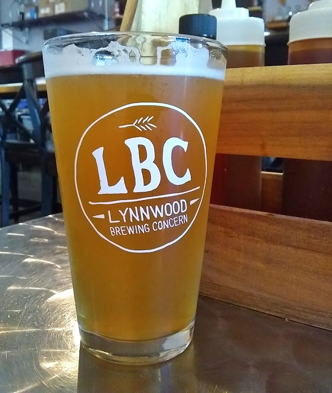 A golden glass of local craft beer&mdash;because what pairs better with barbecue than something brewed by people who understand North Carolina thirst?