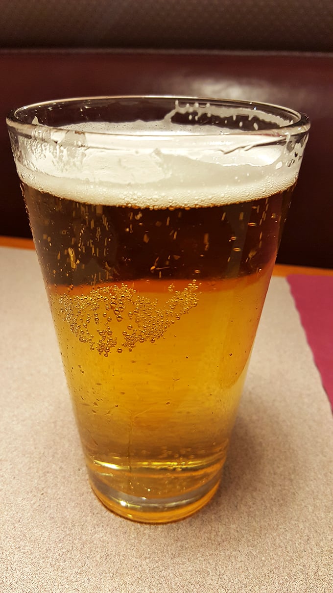 Cold beer waiting patiently to accompany that hot chicken &ndash; a partnership as old as time.