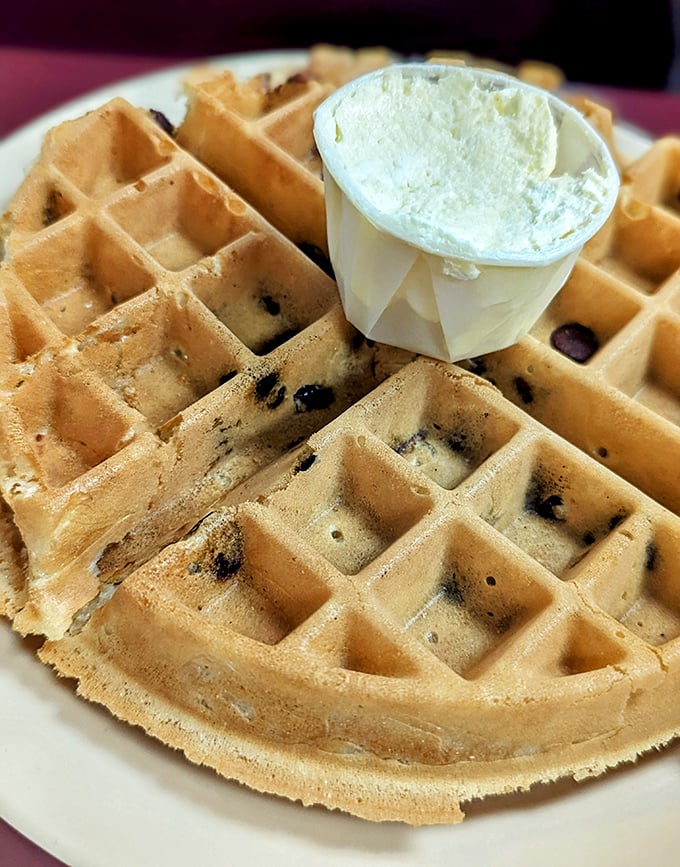 This Belgian waffle isn't just breakfast&mdash;it's architecture with deep pockets perfectly designed to hold rivers of butter and maple syrup.