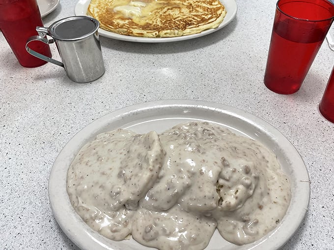 Biscuits swimming in creamy sausage gravy &ndash; a dish so comforting it should come with a pillow and blanket for the inevitable food coma.