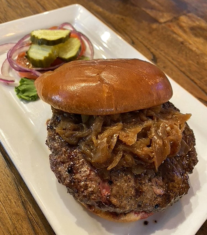 The Bison Burger topped with caramelized onions is the sophisticated cousin in the burger family&mdash;leaner, more complex, but still knows how to party.