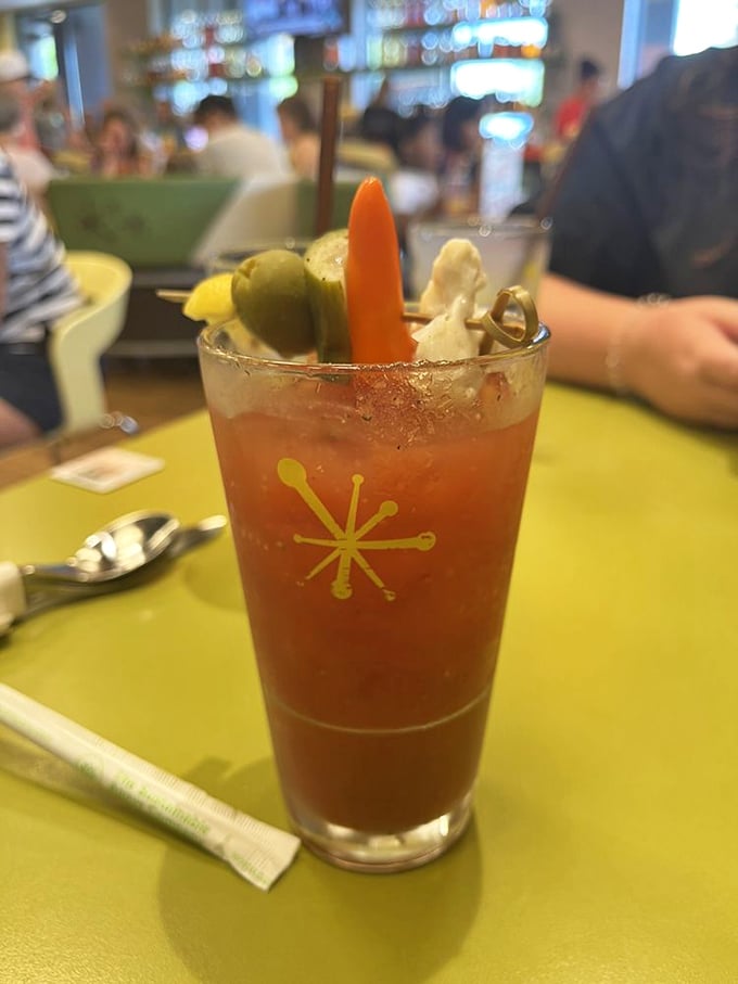 This Bloody Mary isn't just a drink; it's a garden party in a glass with enough garnishes to count as a salad course.