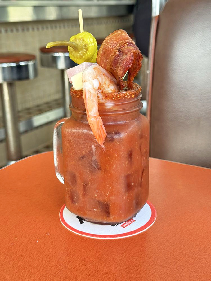 This isn't just a drink&mdash;it's a meal in a glass. That bacon garnish isn't decoration; it's a promise of the flavor journey ahead.