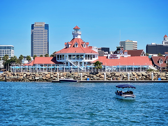 That little harbor boat cruising by is living its best life, probably offering better commute views than your freeway.