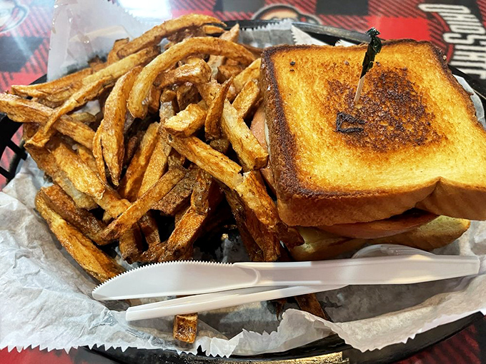 Grilled perfection between two slices of toast, with fries that look like they were hand-cut by angels with very sharp knives.