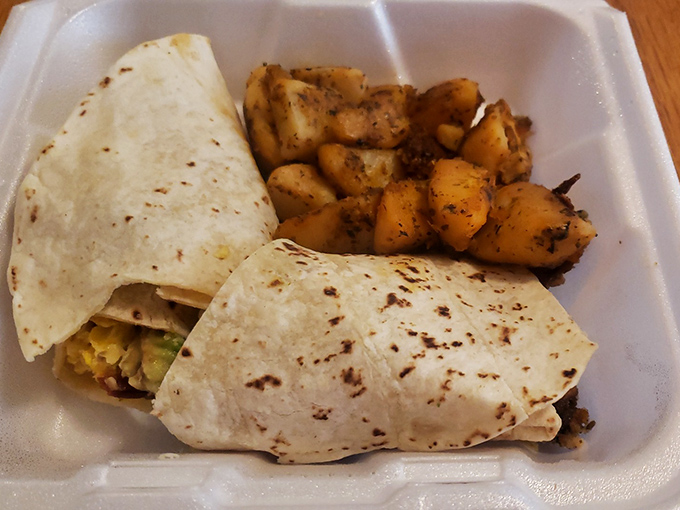 Even in takeout form, this breakfast burrito maintains its dignity—a portable feast of morning favorites wrapped in a warm tortilla embrace.
