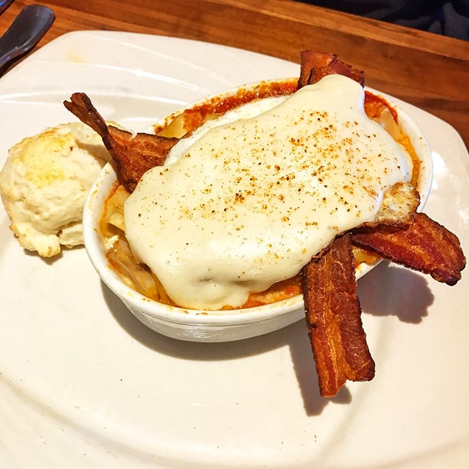 Breakfast lasagna? Someone deserves a Nobel Prize for this creation topped with bacon strips standing at attention.