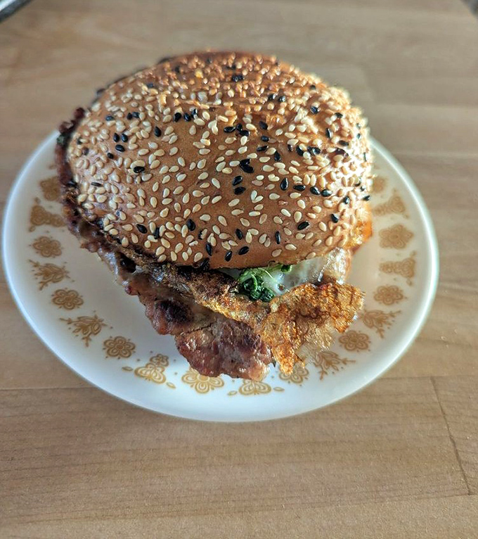 This isn't just breakfast between bread &ndash; it's morning salvation with a golden sesame crown that deserves its own zip code.