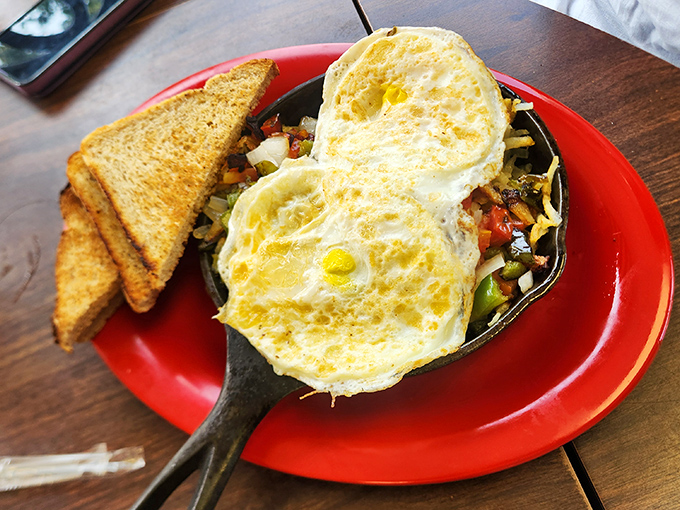 Breakfast skillets at Fuzzy's don't whisper&mdash;they announce themselves with sizzling authority and eggs that seem to wink at you from atop their vegetable throne.