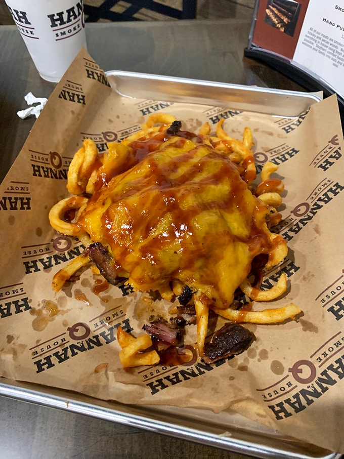 Behold: the ultimate cheat day on a tray. Fries topped with brisket and cheese create the kind of mess worth making&mdash;and the napkins worth using.