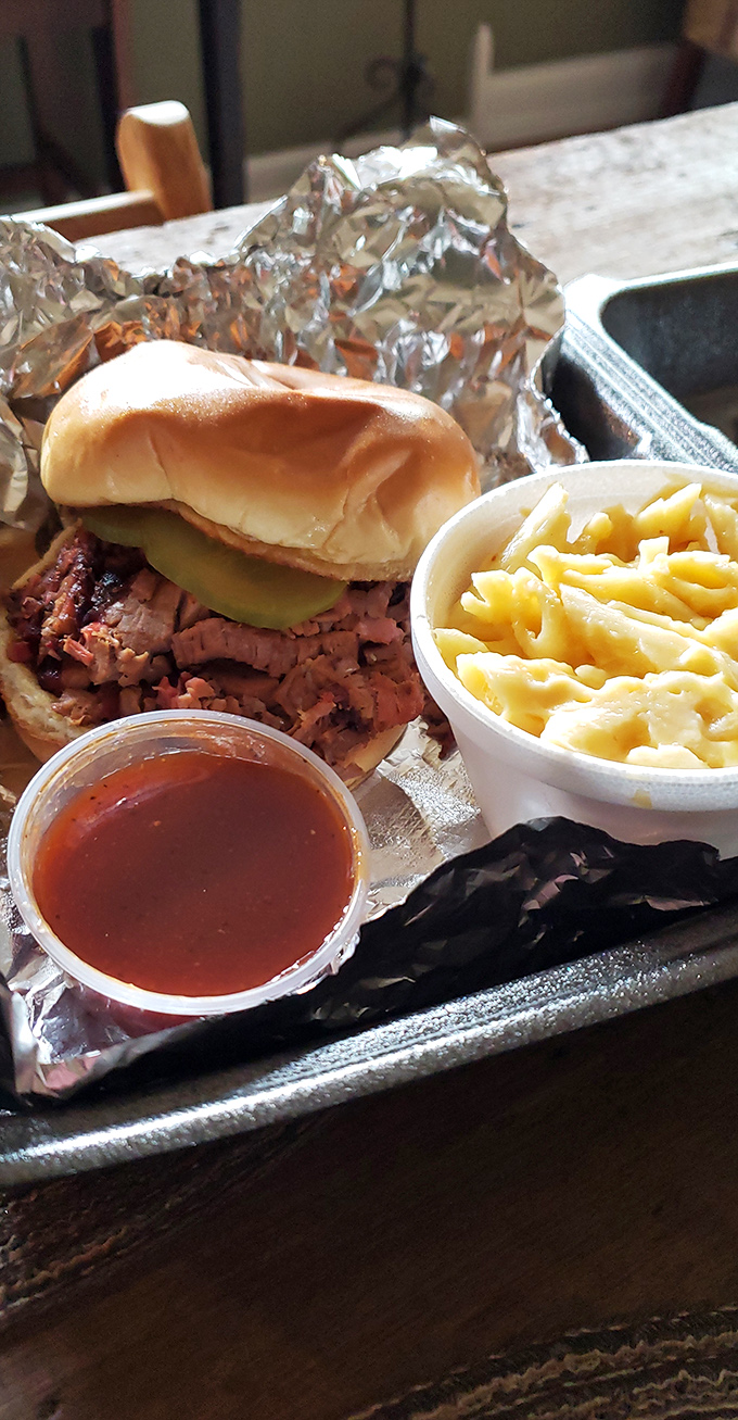 That brisket sandwich with mac and cheese and sauce shows how to build a proper plate without overthinking the formula.