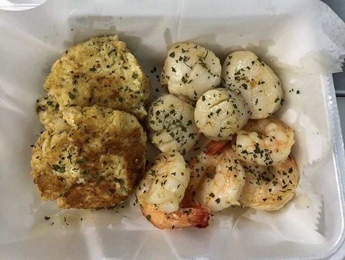 This isn't just a meal; it's a seafood celebration where jumbo shrimp meet their destiny alongside two perfect sides.