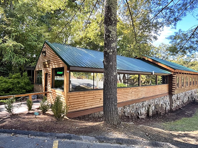 This rustic log cabin restaurant looks like it was plucked from a travel magazine, promising comfort food that feeds both body and nostalgia.