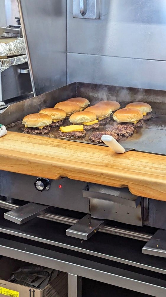 Burger alchemy in progress&mdash;watching these patties transform on the flat-top grill is the kind of food theater that needs no Broadway ticket.