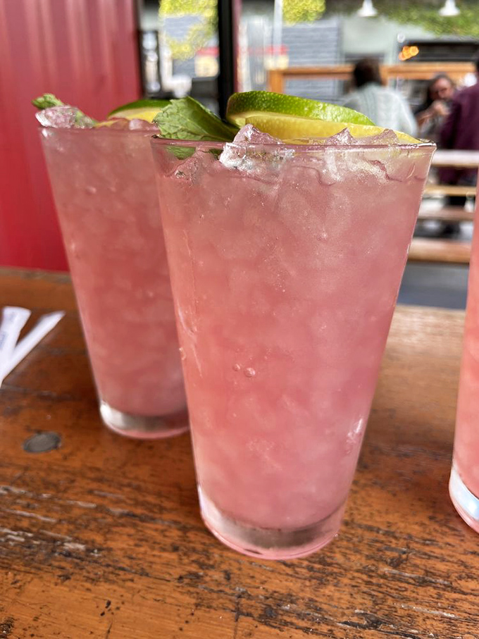 Pink lemonade that's dressed for the occasion. These aren't just refreshing beverages—they're the diplomatic peacekeepers between your taste buds and the spicy BBQ assault.