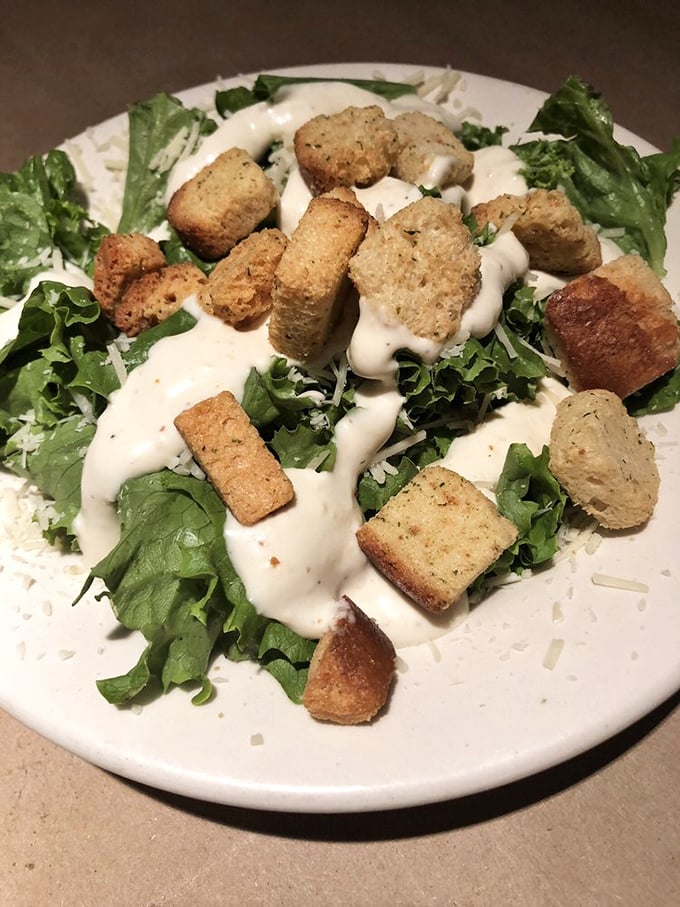 Even the salad gets the royal treatment. Crisp greens and homemade croutons prove that The Blue Crab knows how to make even the supporting acts shine.