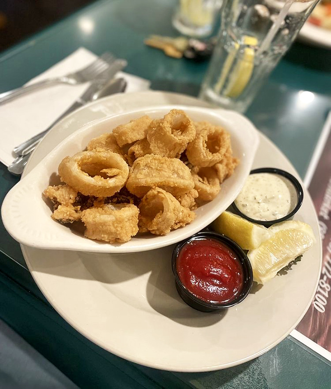 Golden-fried calamari rings that snap with each bite &ndash; proof that simplicity, when executed perfectly, beats complexity every time.