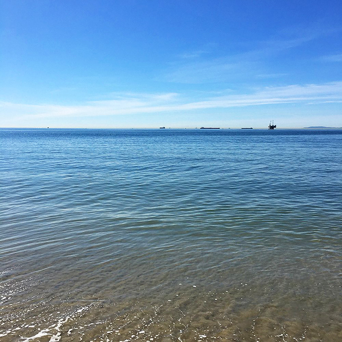 The Pacific stretches to the horizon in fifty shades of blue, proving that sometimes the most spectacular view requires nothing but water and sky.