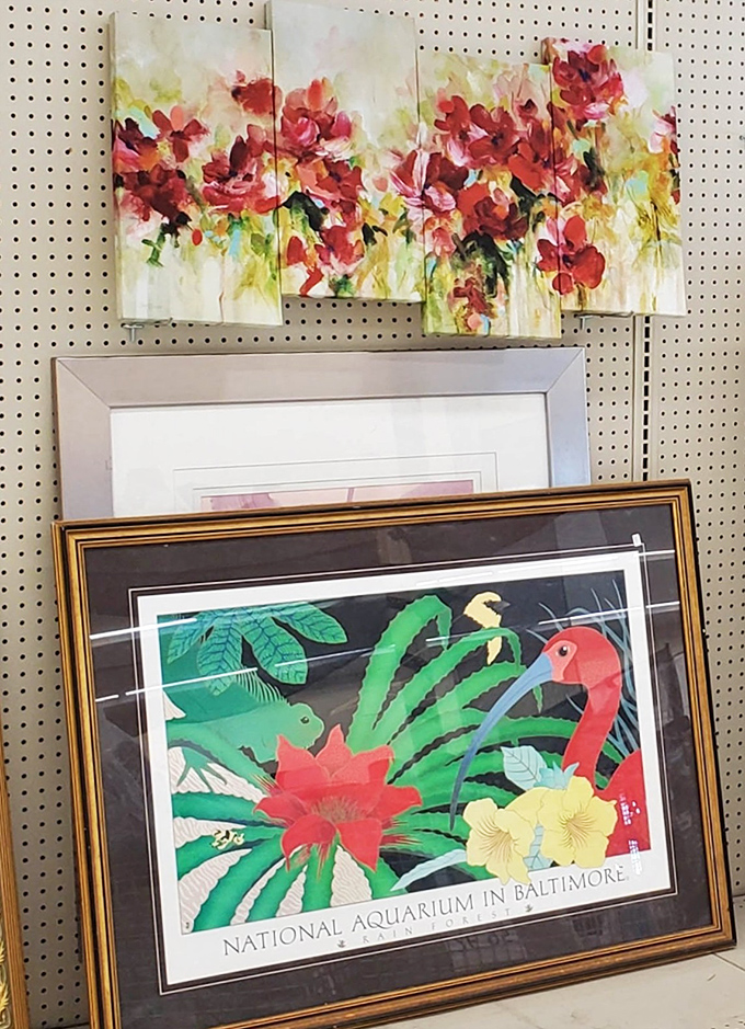 Art that once graced someone else's walls waits for a second chance. That Baltimore Aquarium print is practically begging to come home with you.