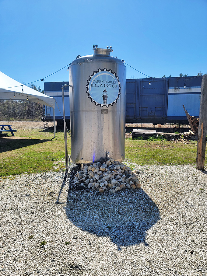 Cape Charles Brewing Company's gleaming equipment stands like a beacon of hope for thirsty travelers seeking craft refreshment after a day of exploration.