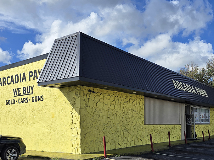 Arcadia Pawn's no-nonsense yellow exterior advertises "We Buy Gold, Cars, Guns" – a one-stop shop for life's essentials in rural Florida.