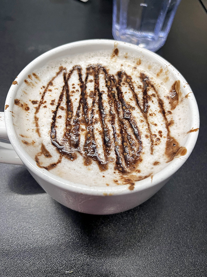 This cappuccino isn't just coffee; it's liquid motivation artfully drizzled with chocolate &ndash; morning fuel that doubles as an Instagram opportunity.