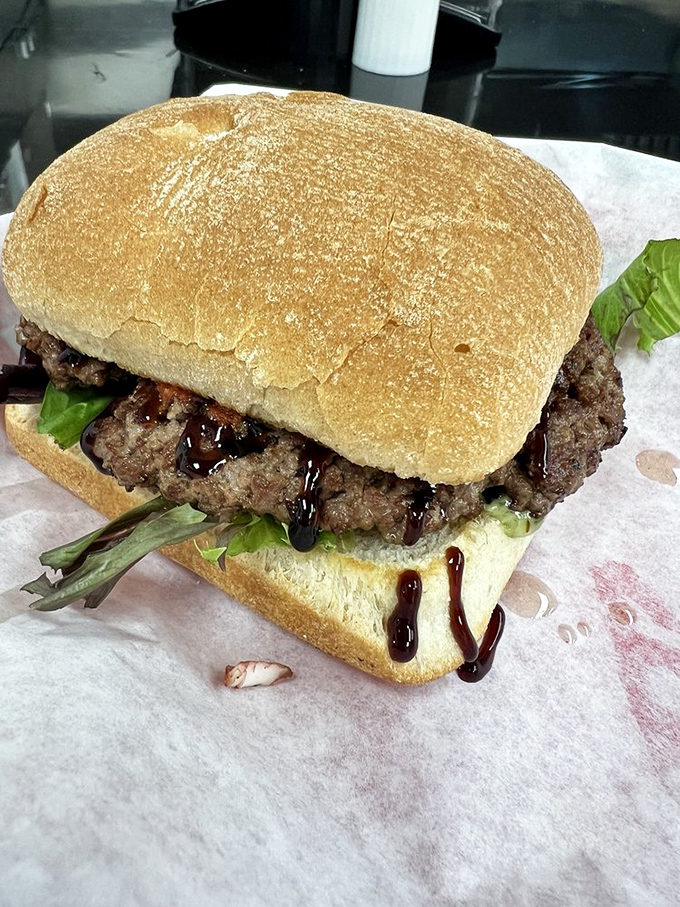 A burger dripping with possibility and BBQ sauce. The kind that makes you involuntarily close your eyes on the first bite.
