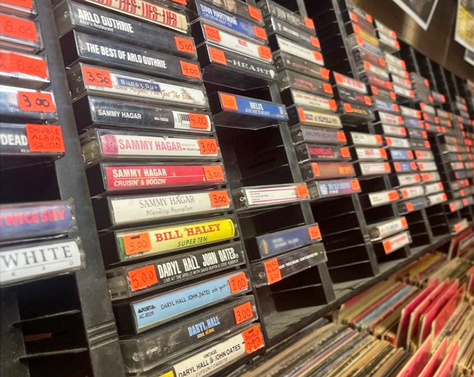 Cassette tapes lined up like soldiers of sound—Sammy Hagar and Daryl Hall would be proud to see their musical legacy preserved in plastic.