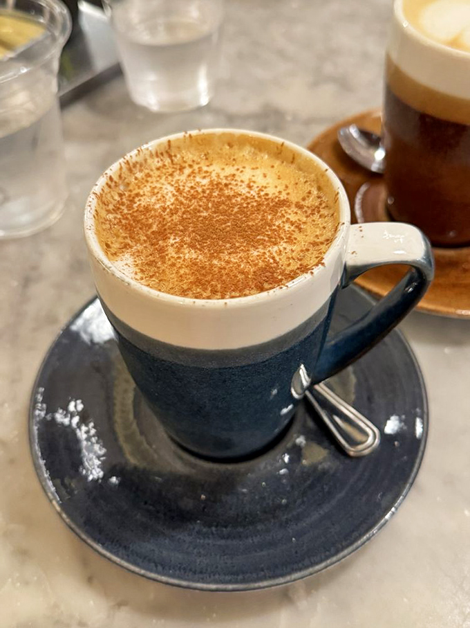 Their chai latte isn't just a drink, it's a warm hug in a mug &ndash; spiced perfectly and topped with a dusting of cinnamon artistry.