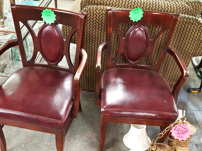 These mahogany chairs with their rich burgundy upholstery look like they've hosted fascinating dinner conversations and are ready for more.