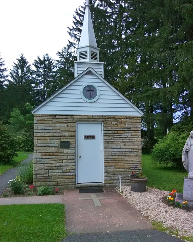This tiny chapel stands as a serene reminder that spiritual moments await in unexpected places. A quiet sanctuary amid nature's grand cathedral.